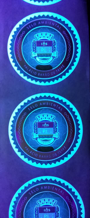 Selo de Segurança com Tinta U.V. - Impressão Invisível - Fit-Plast System